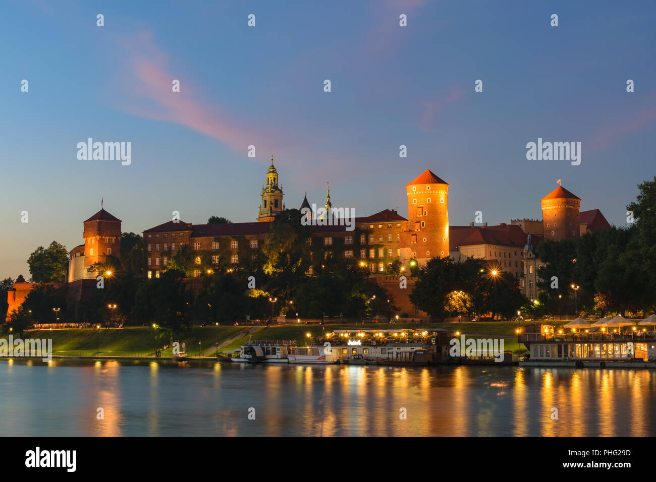 Wawel royal castle view from across the river Vistula (Wisla) at sunset ...