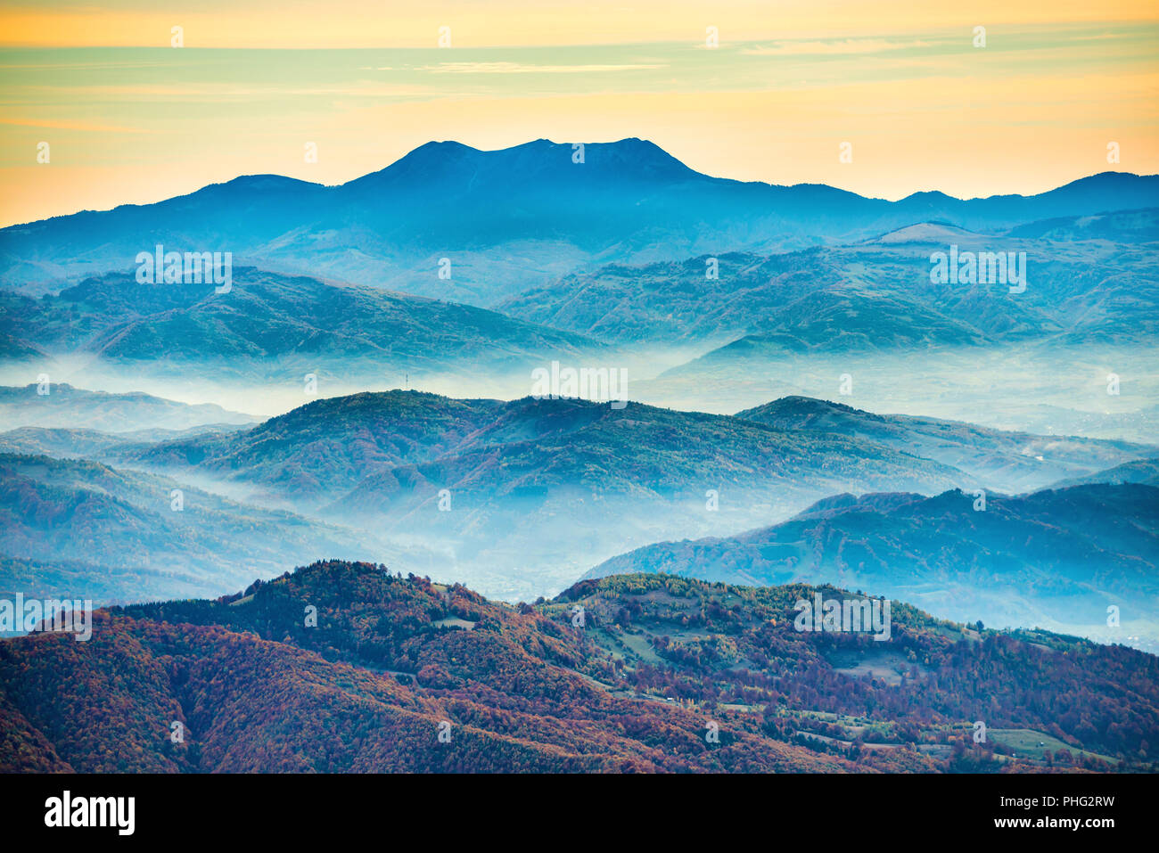 Blue mountains at sunset Stock Photo - Alamy