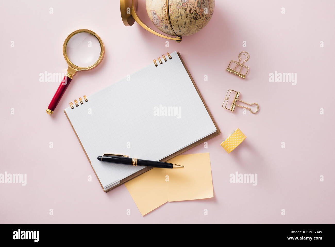 Modern mock up flat lay of notebook and stationery on pink background ...