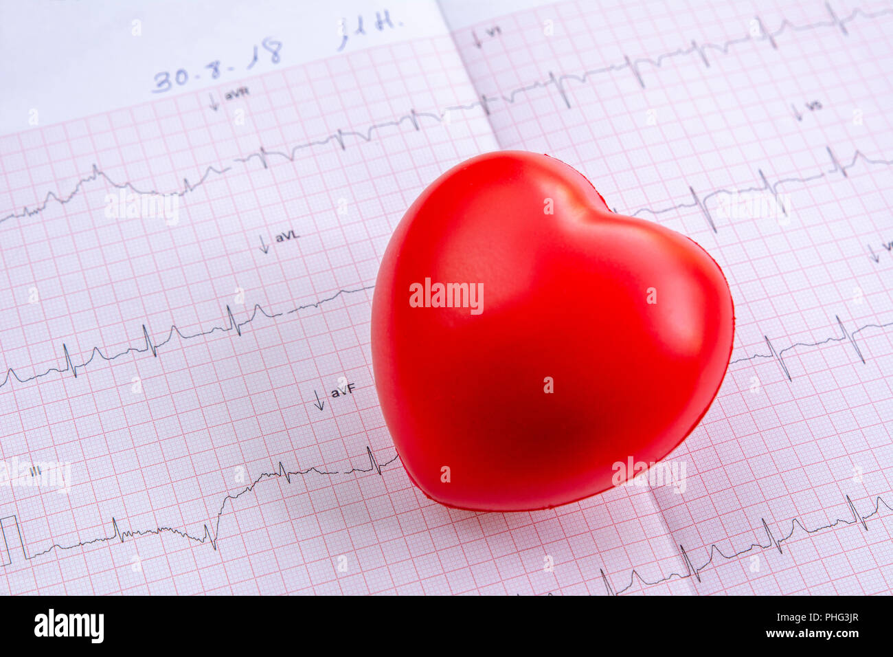 red heart on paper electrocardiogram Stock Photo - Alamy