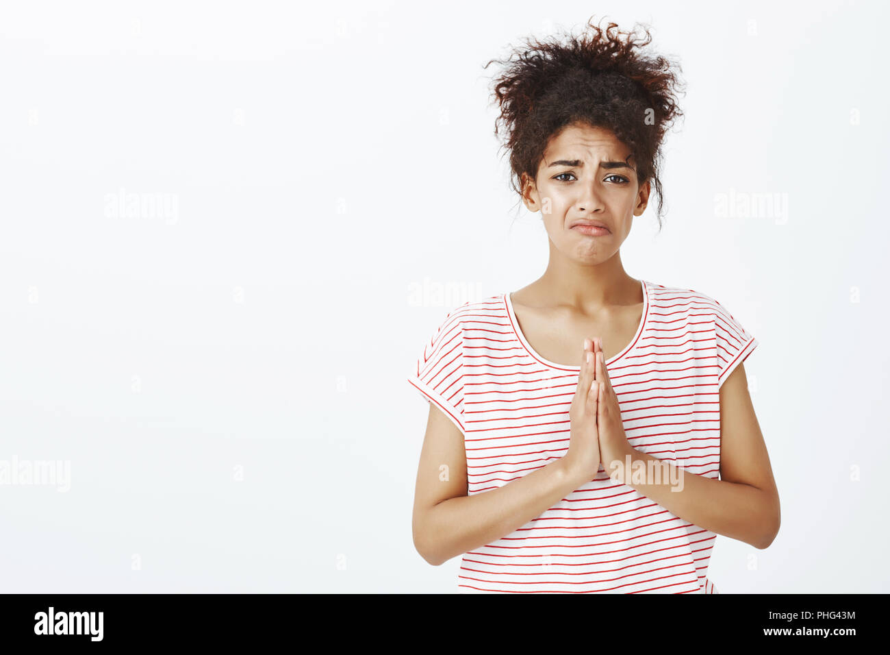 Portrait of sad worried girl begging for help or forgiveness. Portrait ...