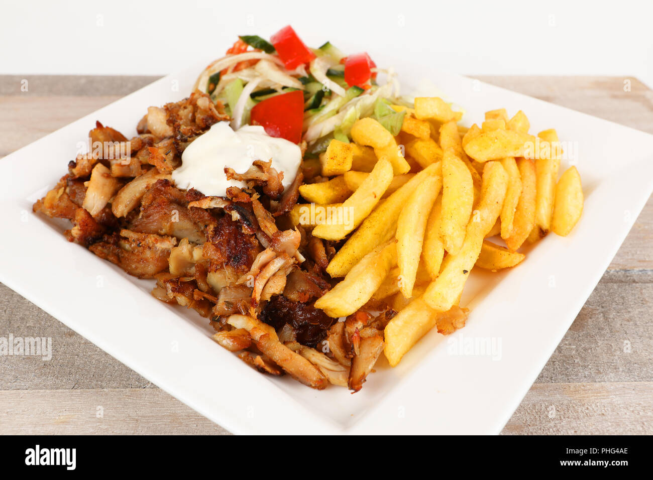 chicken doner with fries and salad Stock Photo - Alamy