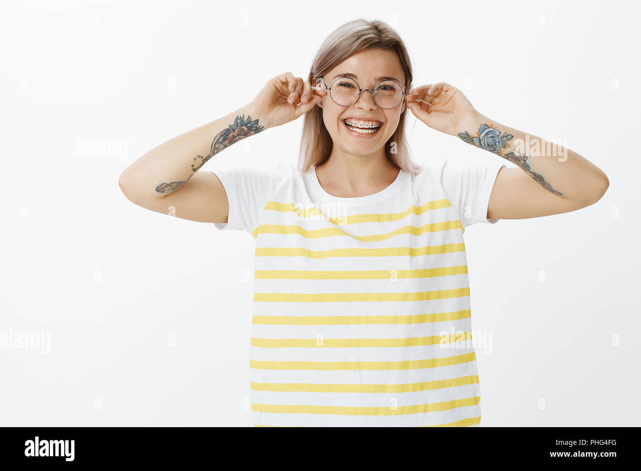 Birthday girl pulling ears up for each year she was born. Positive good ...