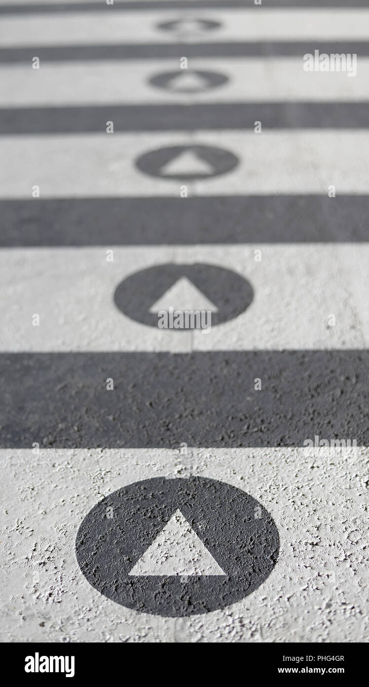 arrow sign on the road Stock Photo - Alamy
