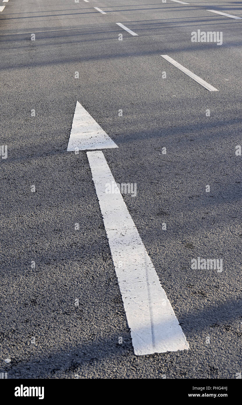 arrow sign on the road Stock Photo - Alamy