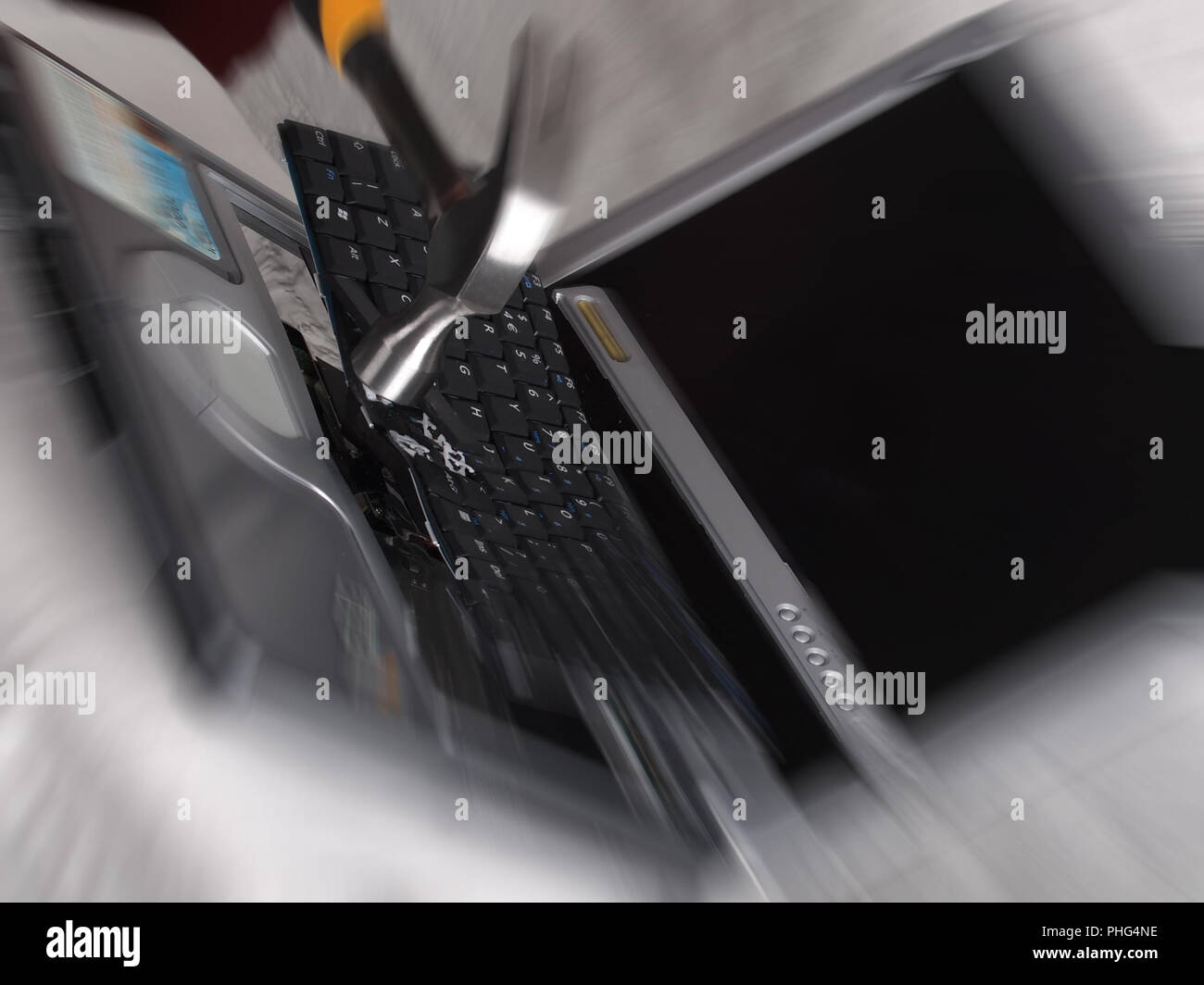 Computer laptop being smashed and destroyed with a hammer Stock Photo ...