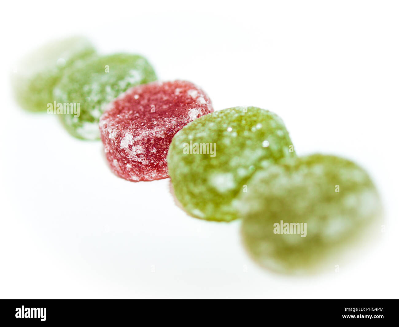 Macro close up of colourful round Jelly Candy Sweets on a white ...