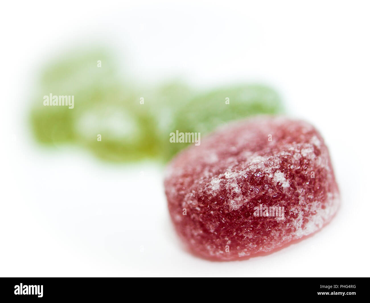 Macro close up of colourful round Jelly Candy Sweets on a white ...