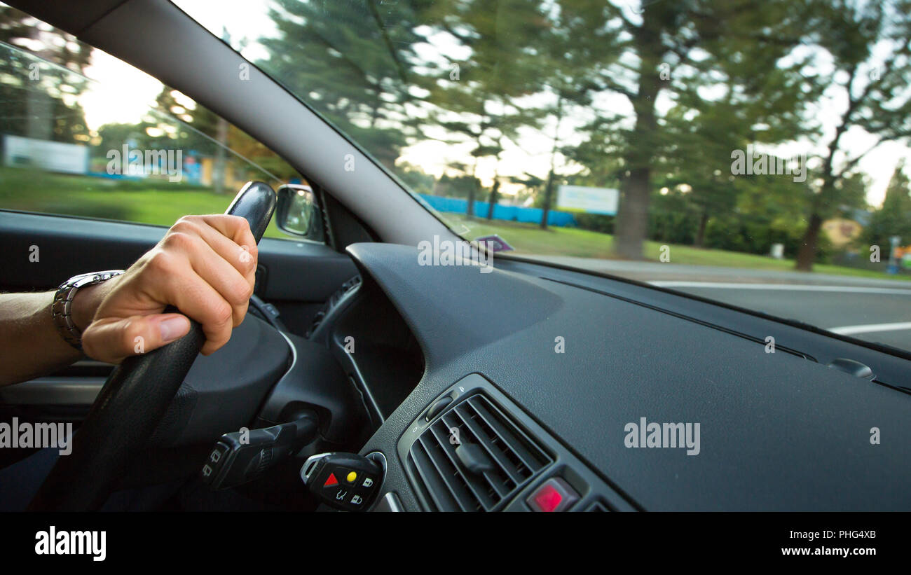 Man driving a car moving fast on a highway (motion blurred image Stock ...