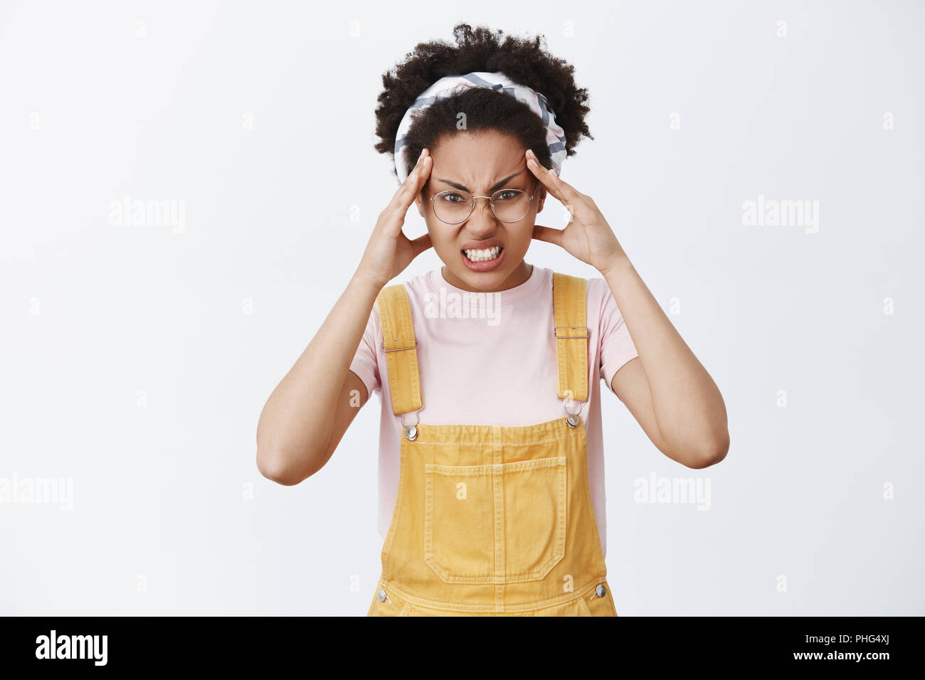 Girl Believes She Can Move Object With Power Of Mind Portrait Of Funny And Angry Cute Female In