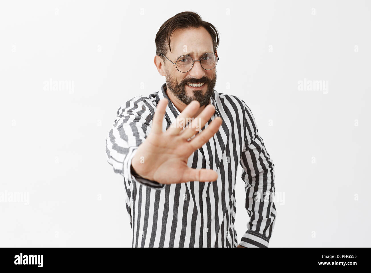 Man stooping hi-res stock photography and images - Alamy