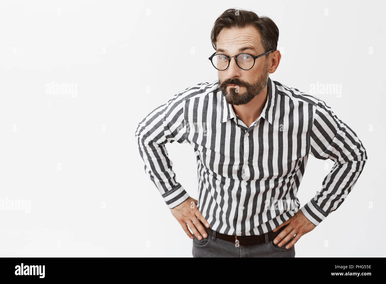 Open up. Portrait of curious charming adult husband with beard and ...