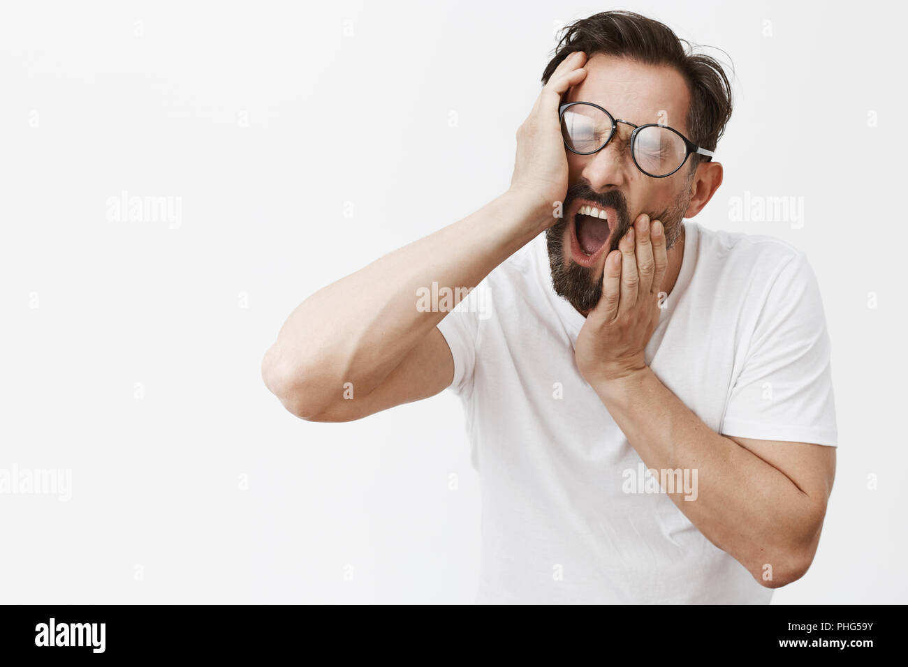 Squeezing cheeks hi-res stock photography and images - Alamy