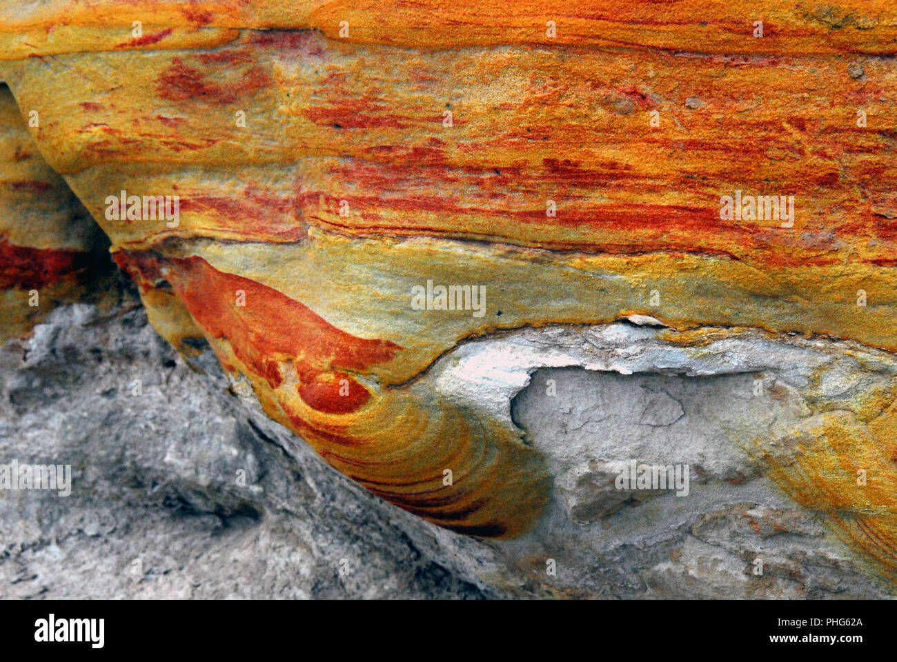 Close-up of an amazingly colorful cliff formation on a beach near Cape ...