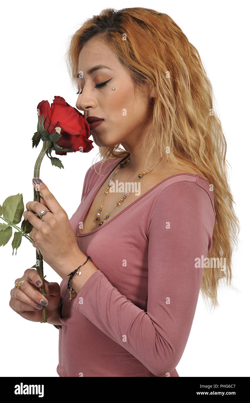 Portrait woman smelling red rose hi-res stock photography and images ...