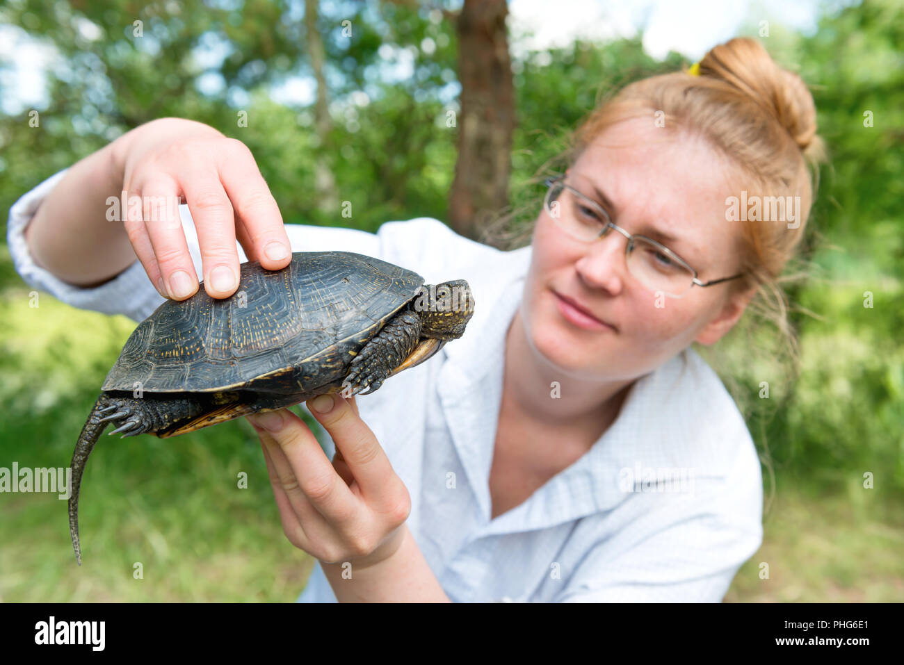 Woman turtle hi-res stock photography and images - Alamy