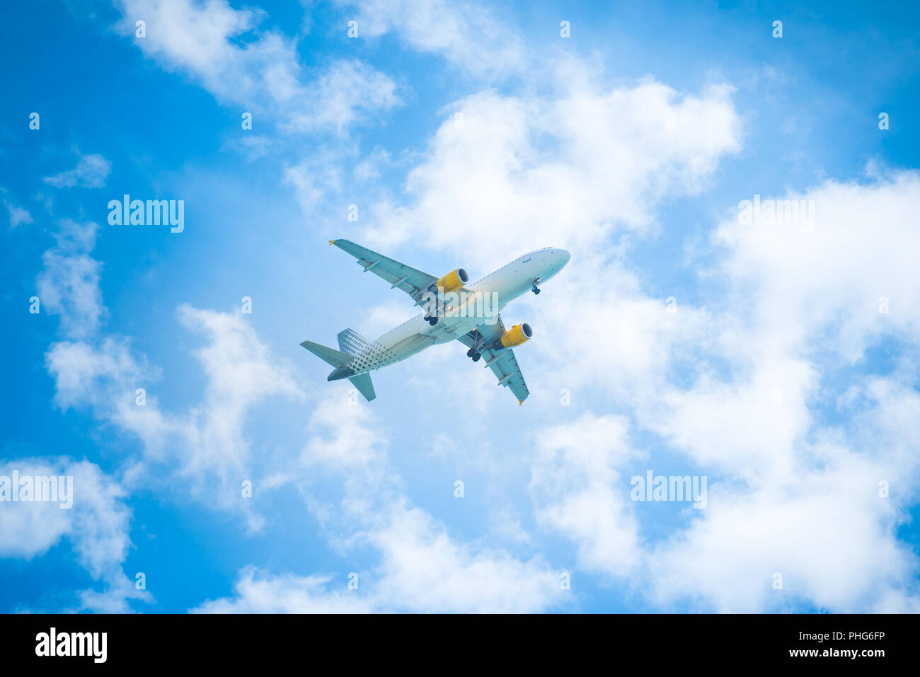 A plane flying in the sky Stock Photo - Alamy