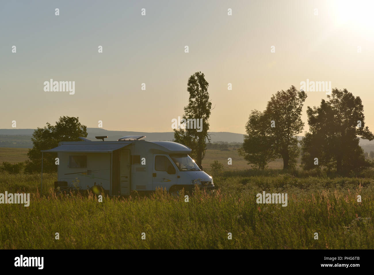 Camper in the forest hi-res stock photography and images - Alamy