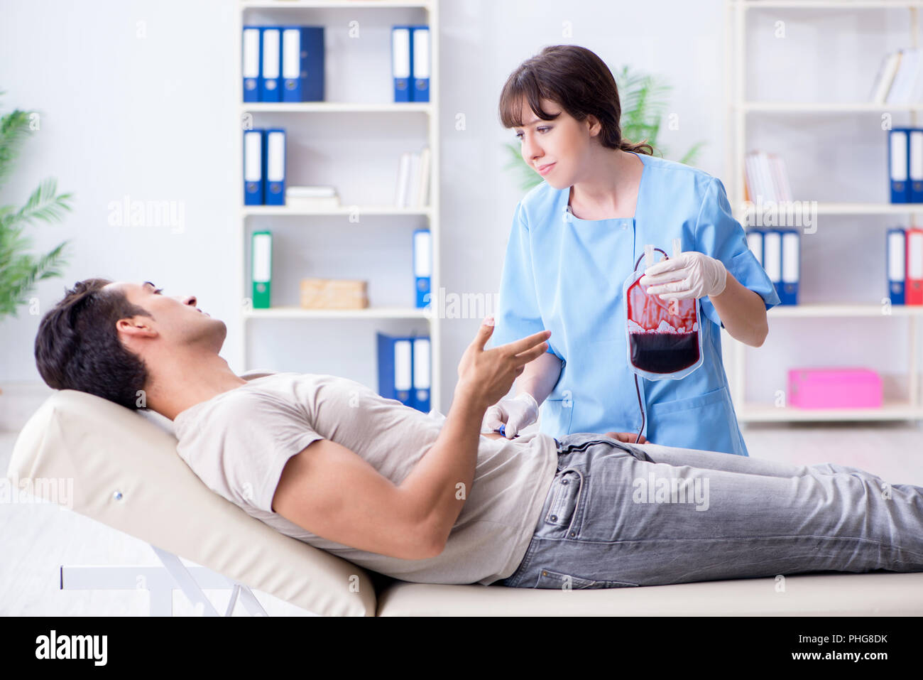 Patient getting blood transfusion in hospital clinic Stock Photo - Alamy