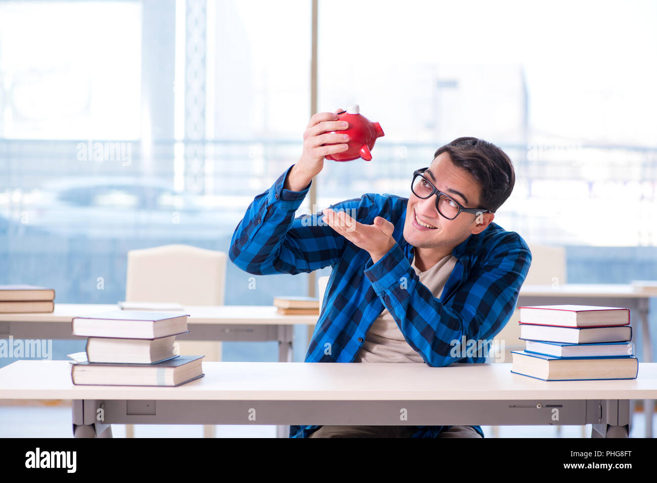 Concept of expensive textbooks and cost of education Stock Photo - Alamy