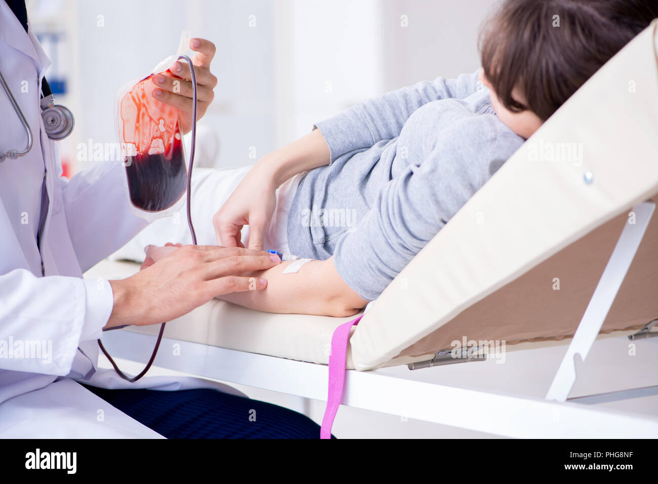 Patient getting blood transfusion in hospital clinic Stock Photo - Alamy