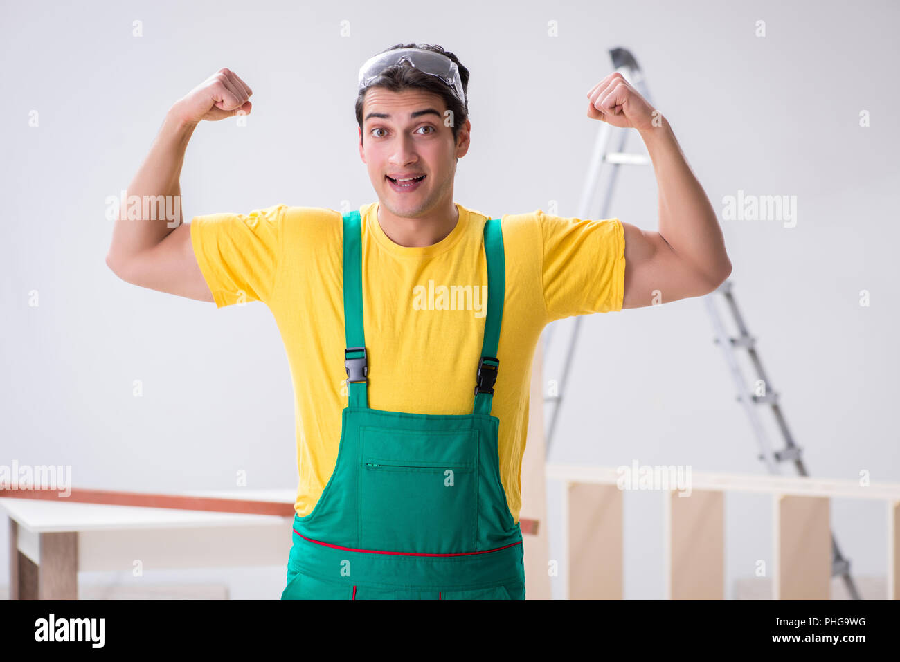 Construction worker working on contractor site Stock Photo - Alamy