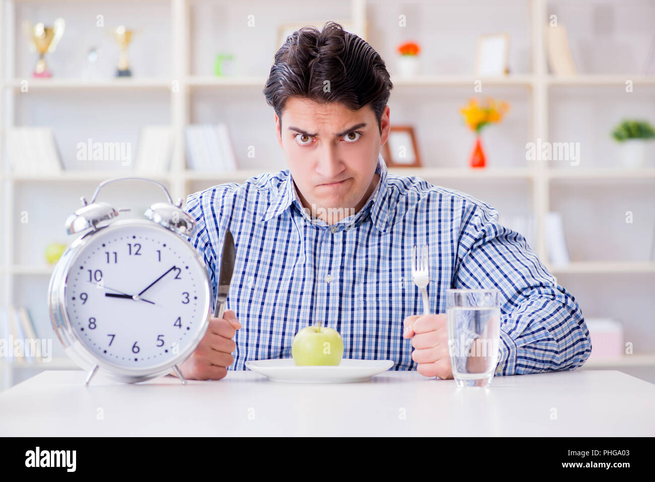 Angry man waiting food in hi-res stock photography and images - Alamy