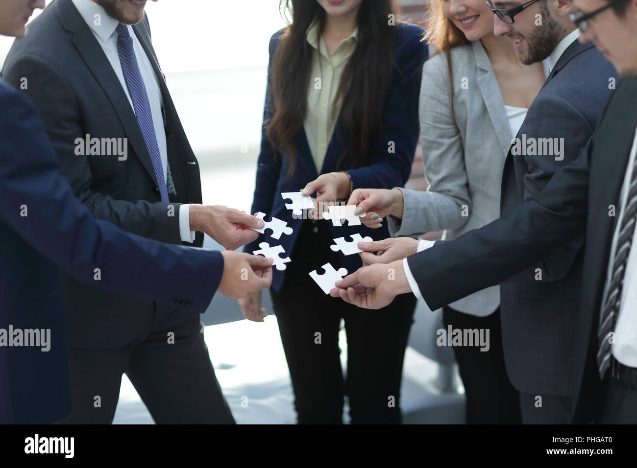 Group Of Business People Assembling Jigsaw Puzzle Team Support Stock group-of-business-people-assembling-jigsaw-puzzle-team-support-stock
