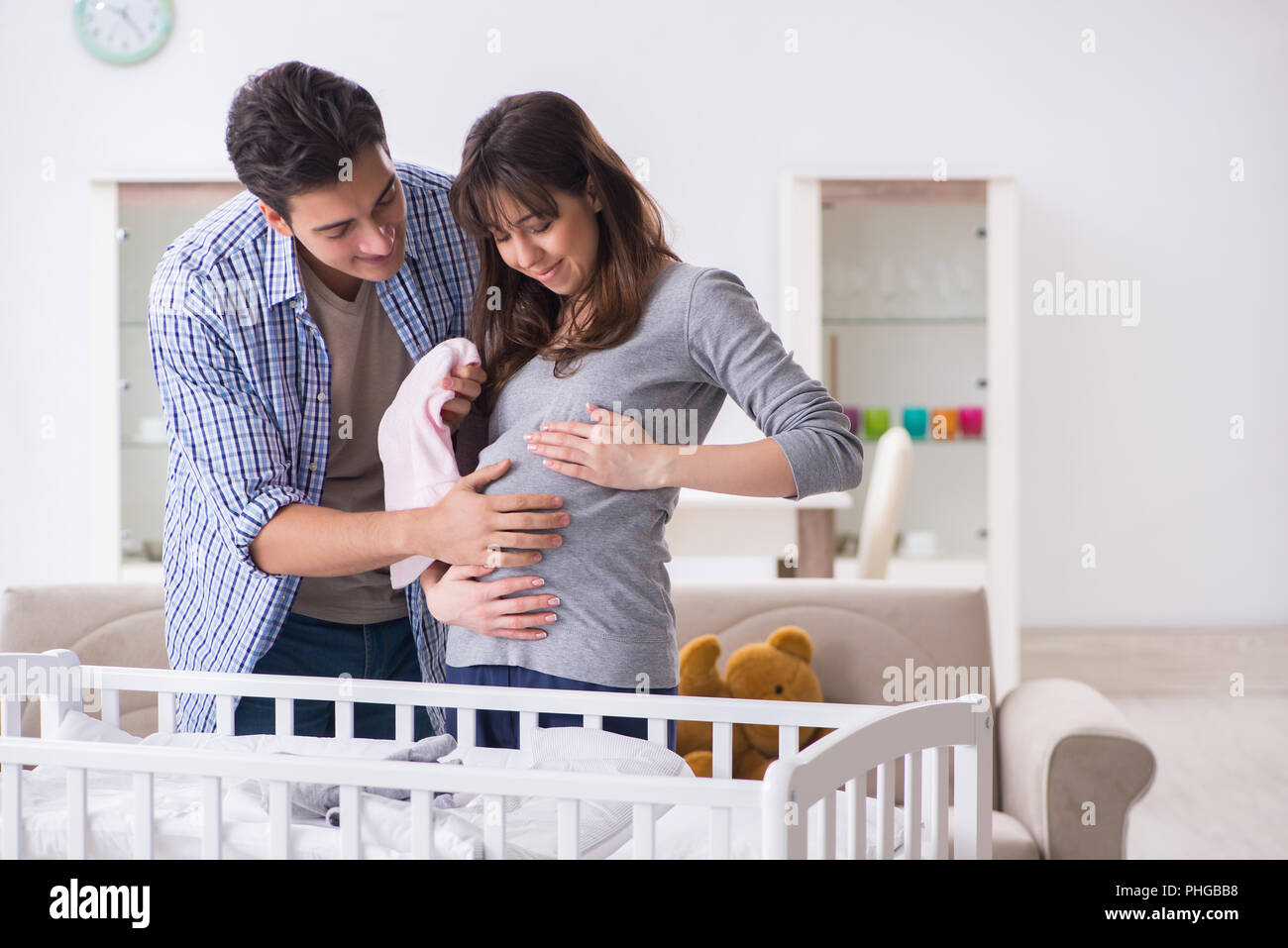 Young parents expecting their first baby Stock Photo - Alamy