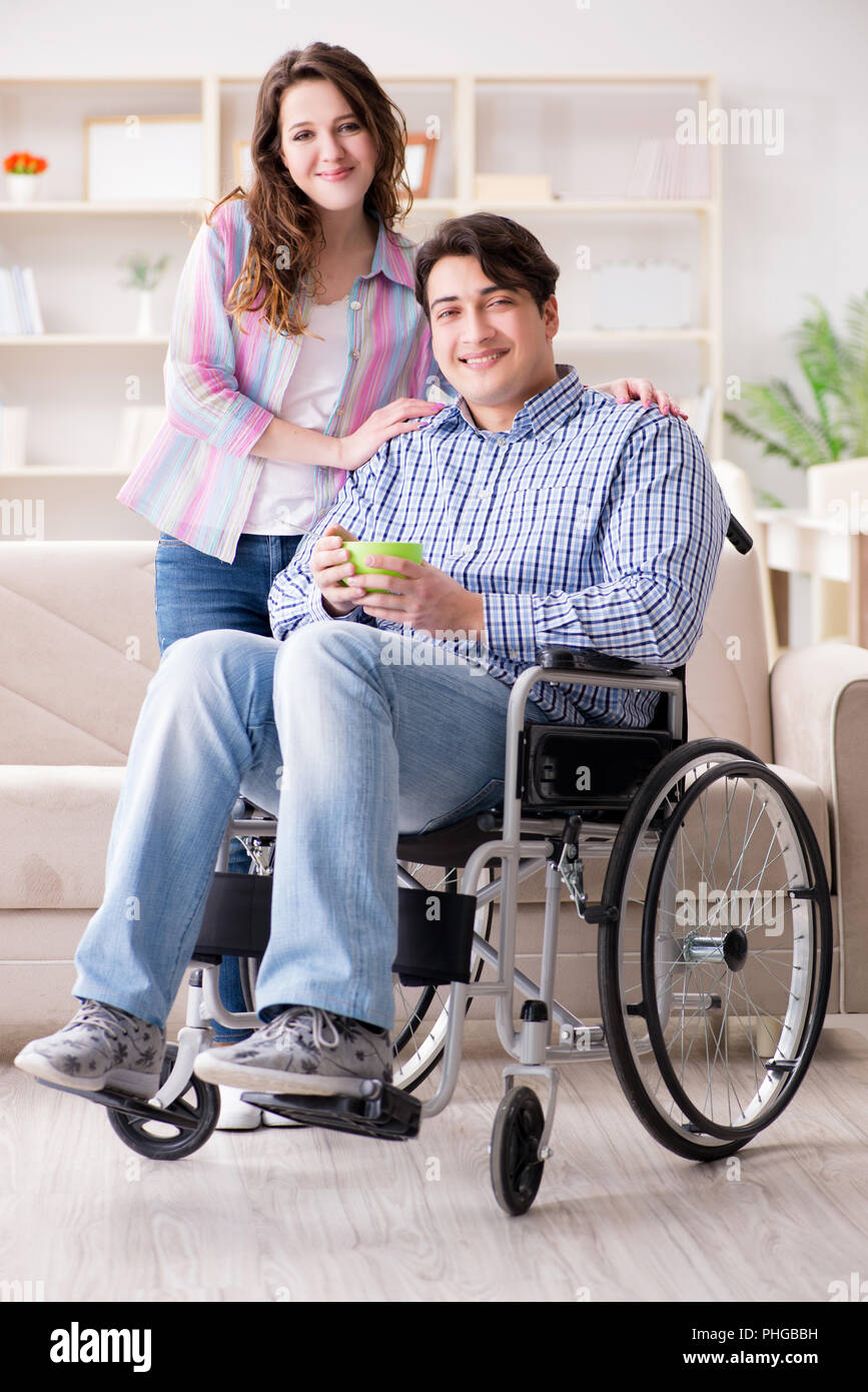 Young family taking care of each other Stock Photo - Alamy