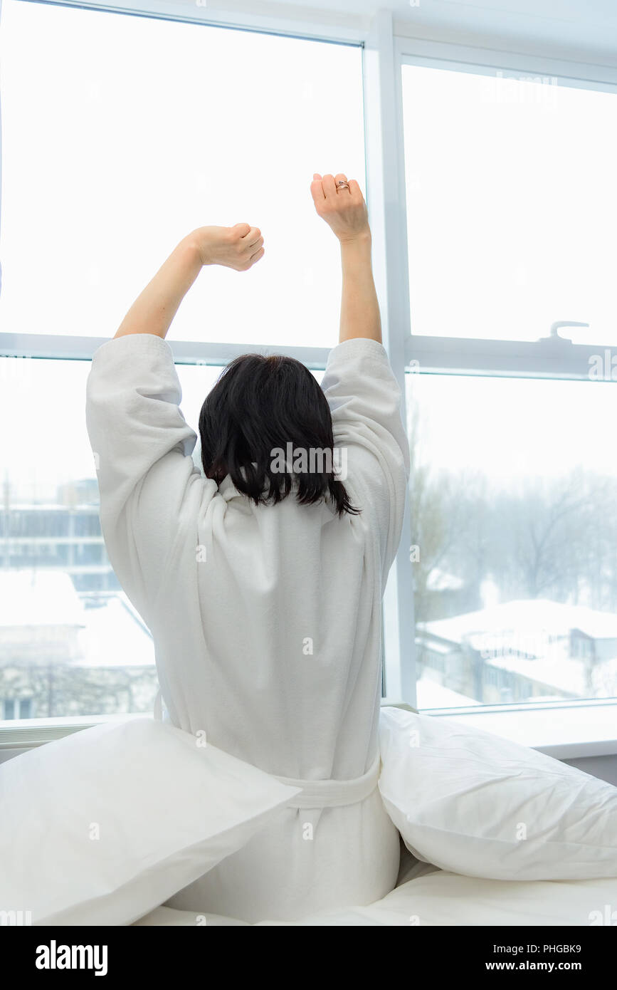 Young woman stretched out in bed hi-res stock photography and images ...