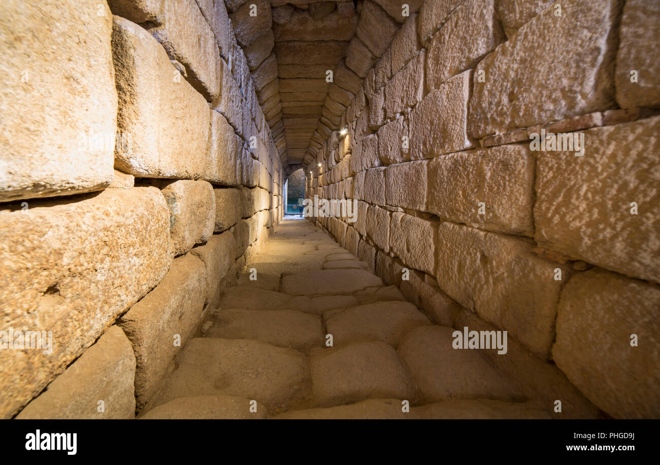South corridor of roman water cistern with visitors at Alcazaba arab ...