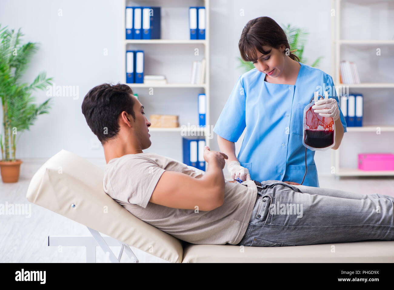 Patient getting blood transfusion in hospital clinic Stock Photo - Alamy
