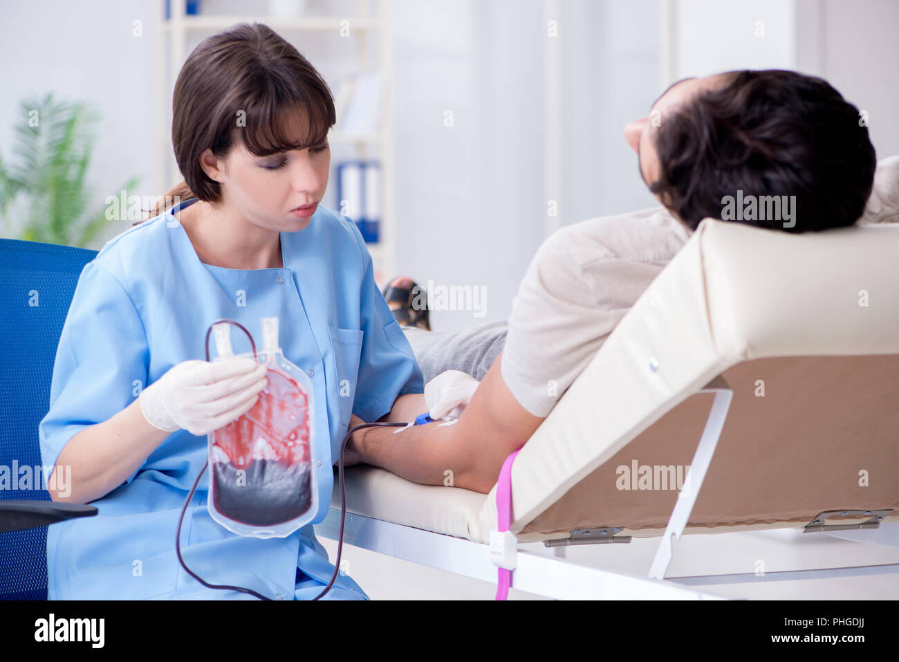 Patient getting blood transfusion in hospital clinic Stock Photo - Alamy