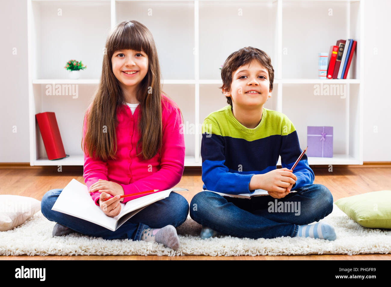 Children doing homework Stock Photo - Alamy