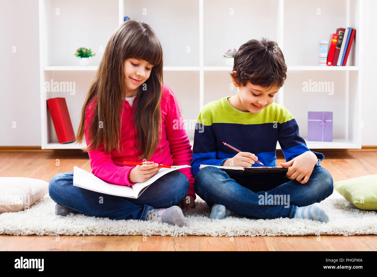 Children doing homework Stock Photo - Alamy