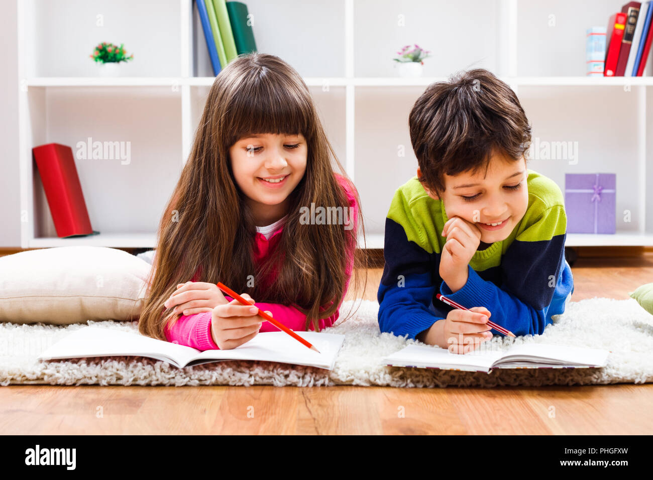 Children doing homework Stock Photo - Alamy