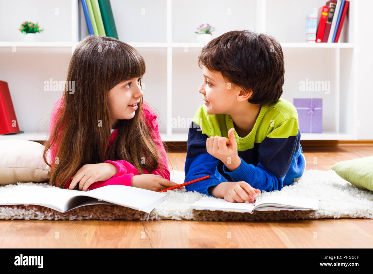 Home boy girl reading talking hi-res stock photography and images - Alamy