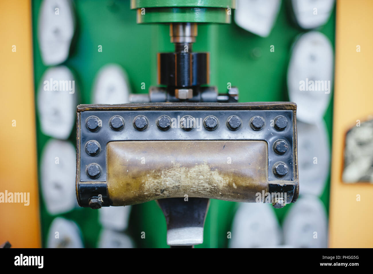 shoemaker workshop machine to reshoke shoes Stock Photo - Alamy