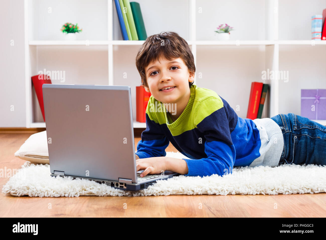 Little boy using laptop Stock Photo - Alamy