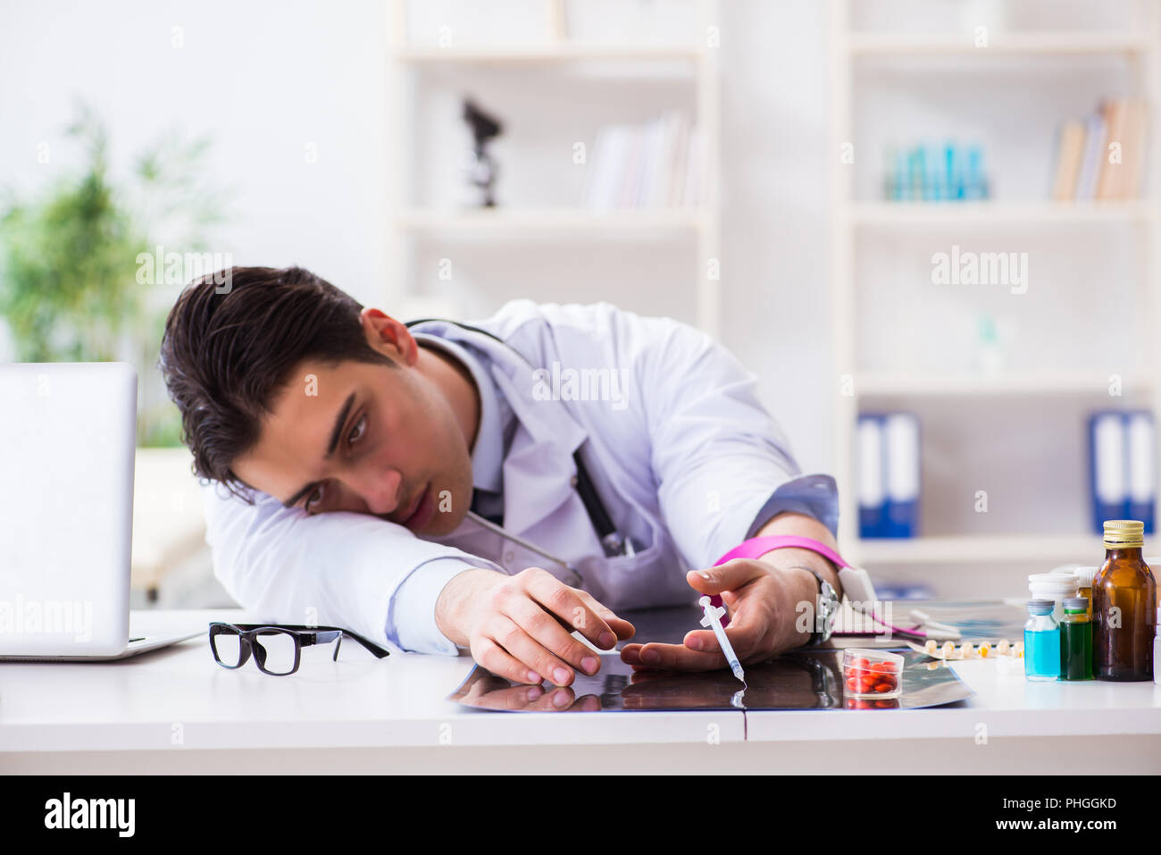 Doctor drug addict in the hospital Stock Photo - Alamy