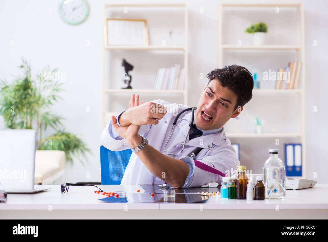 Doctor drug addict in the hospital Stock Photo - Alamy