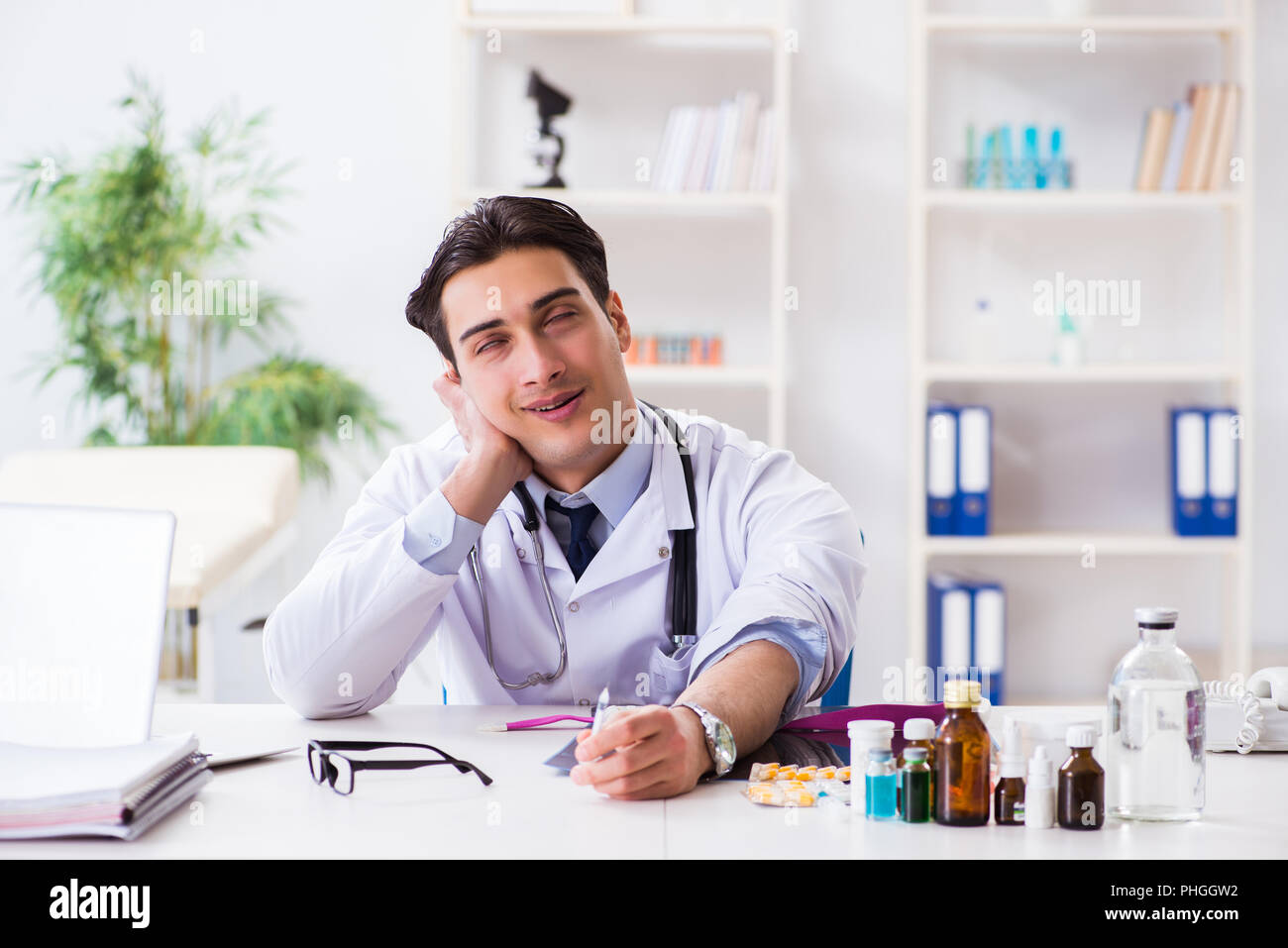 Doctor drug addict in the hospital Stock Photo - Alamy