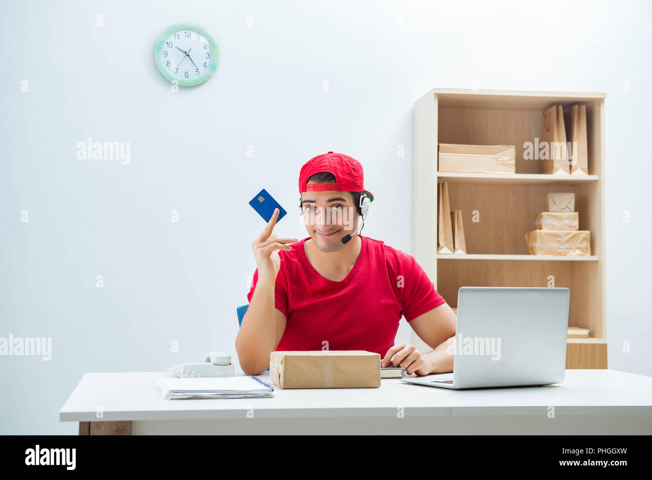 Call center worker at parcel distribution center in post office Stock ...