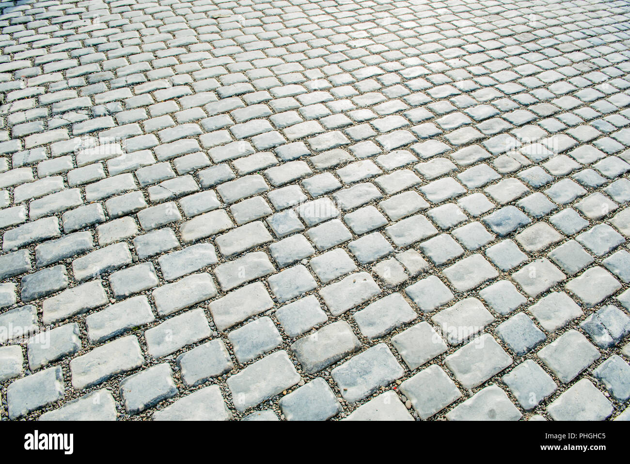 Road paved with cobble stones for your background Stock Photo - Alamy