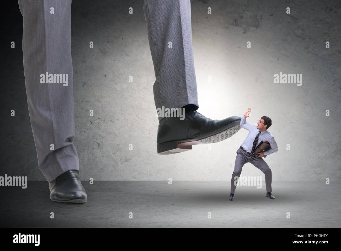 Bad angry boss stamping on employee in business concept Stock Photo - Alamy