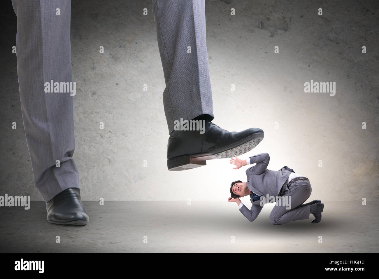Bad angry boss stamping on employee in business concept Stock Photo - Alamy