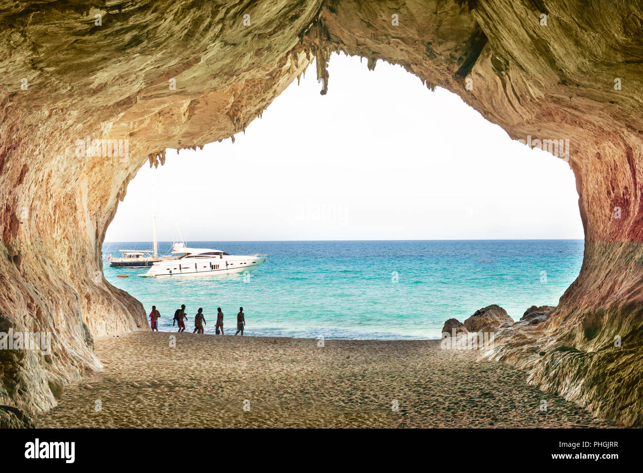 People in the big cave Stock Photo - Alamy