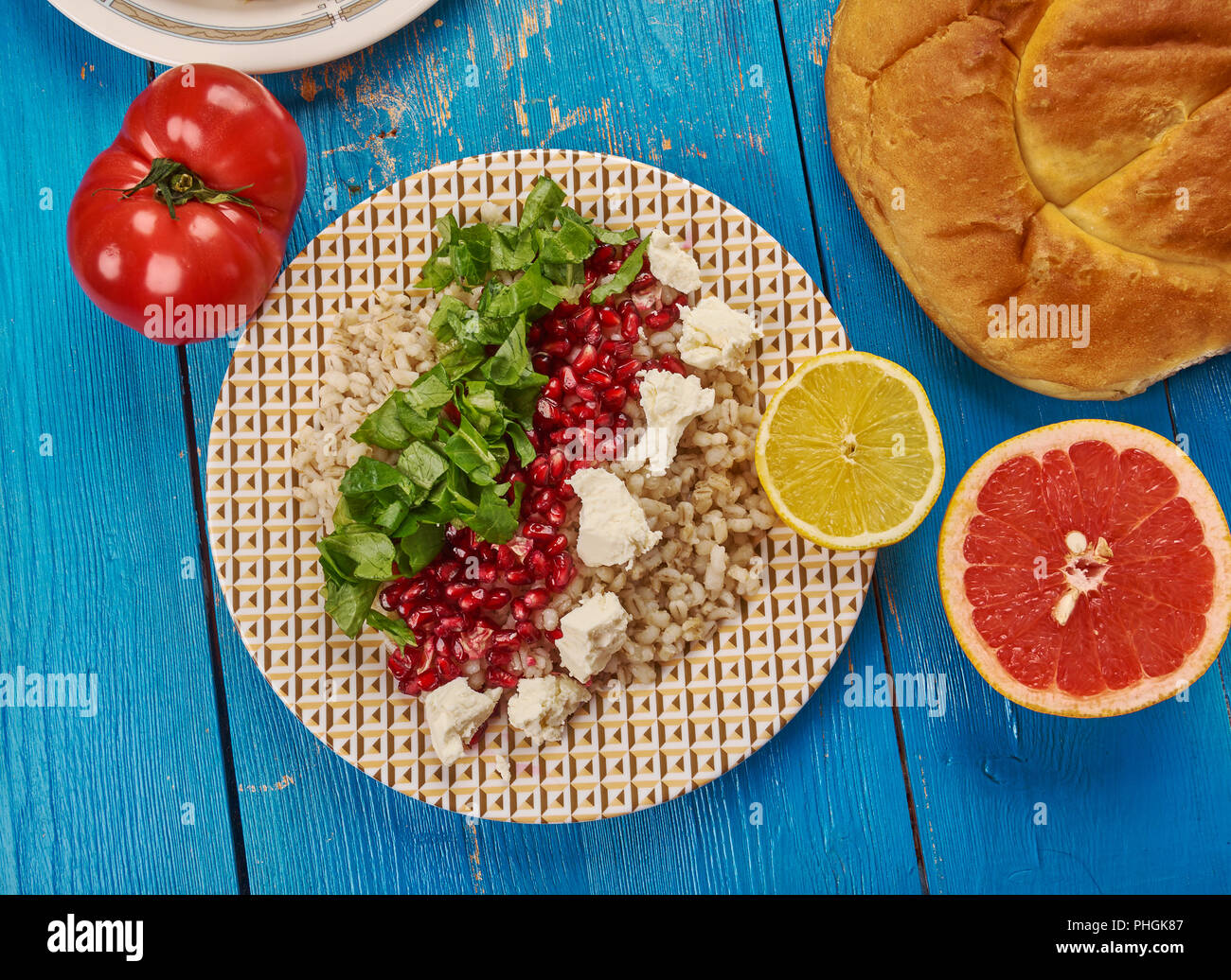 egyptian Barley Salad with Pomegranate Vinaigrette Stock Photo - Alamy