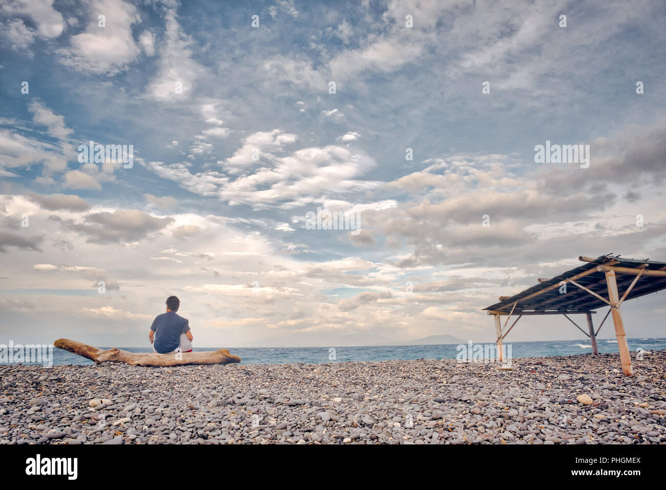 Siblings at Pebbled Beach of Punta Malabrigo, Lobo, Batangas Stock ...